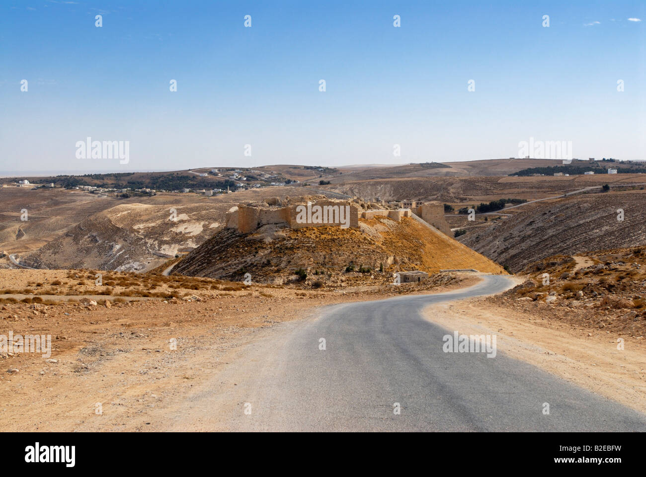Road running through landscape, Jordan Stock Photo - Alamy