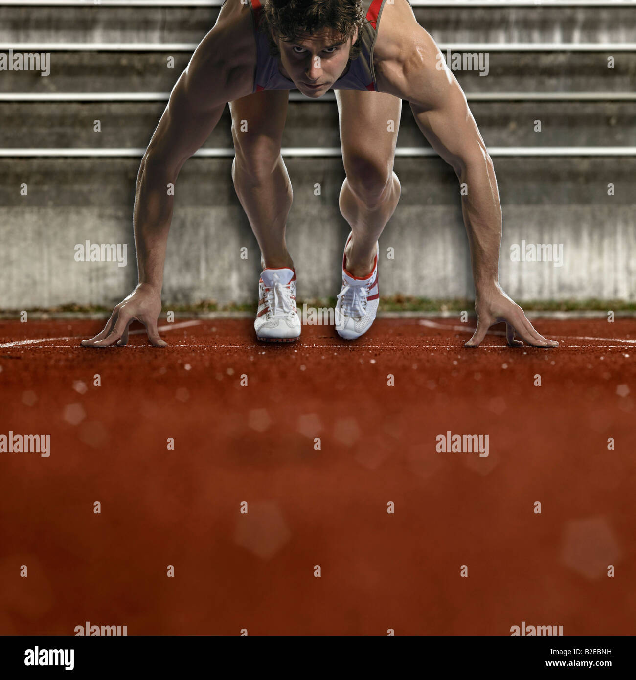 Man on starting blocks Stock Photo - Alamy
