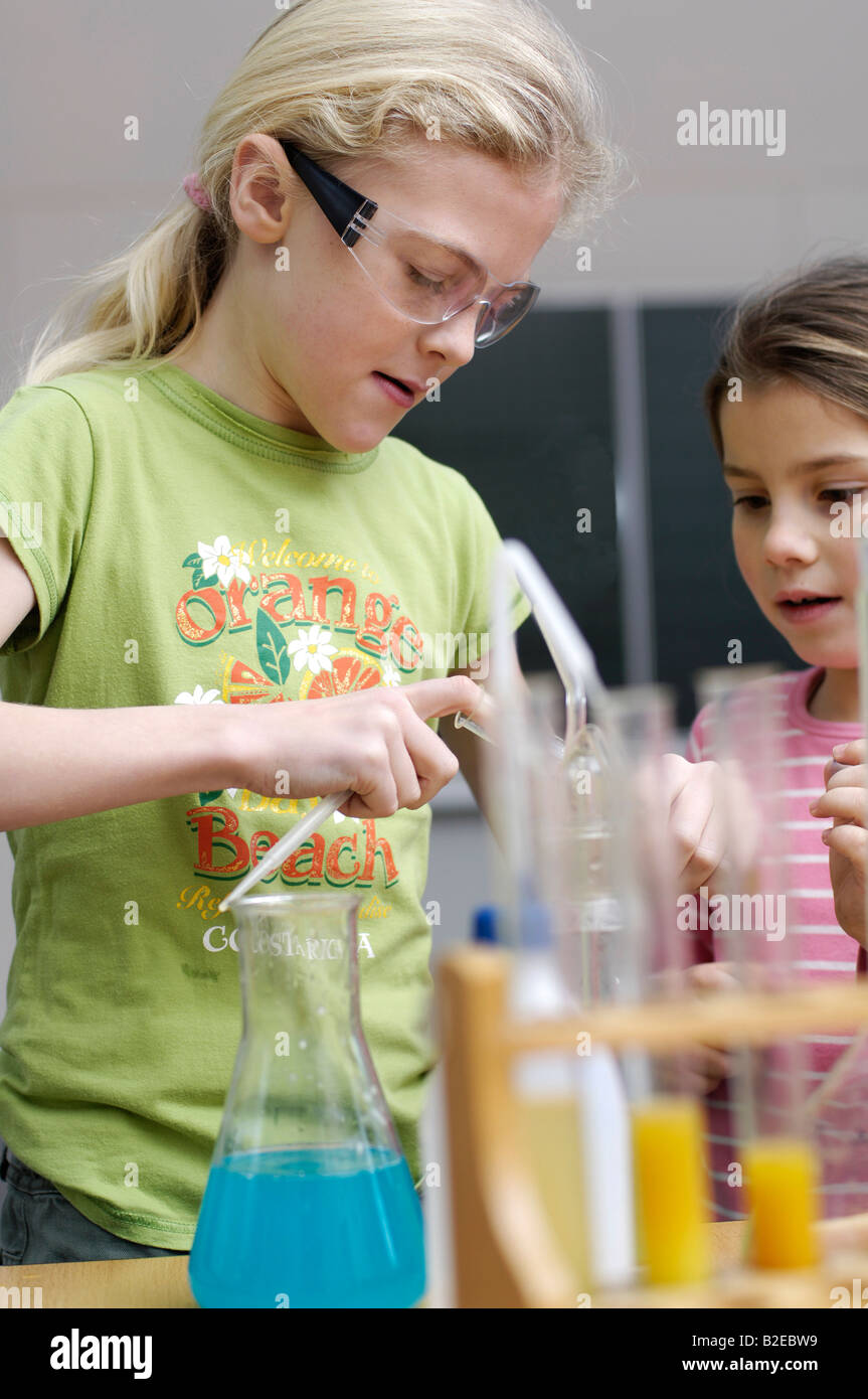 two girls working in laboratory Stock Photo - Alamy