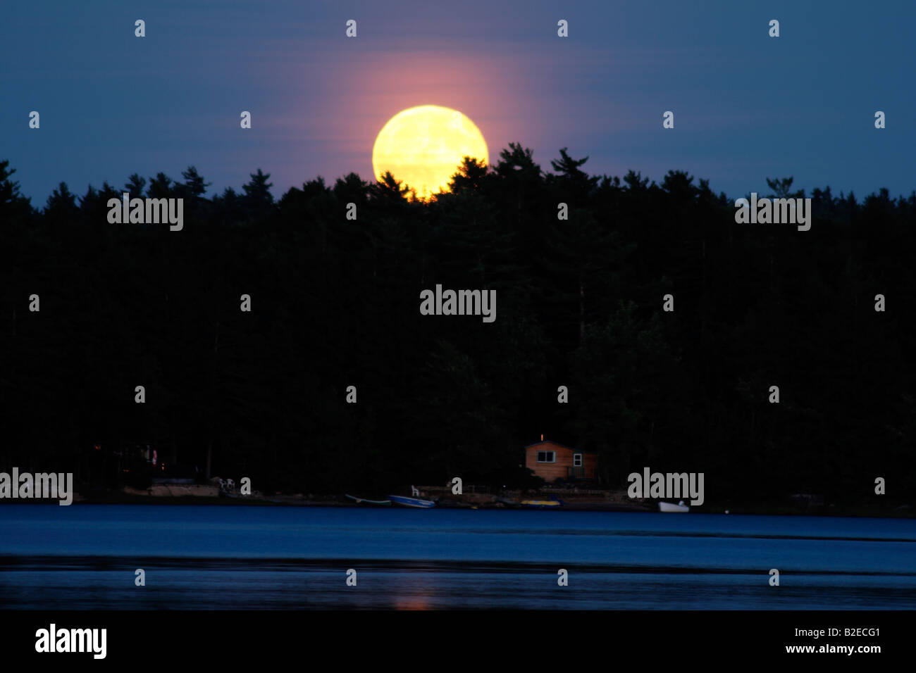 moon rise over a lake Stock Photo - Alamy