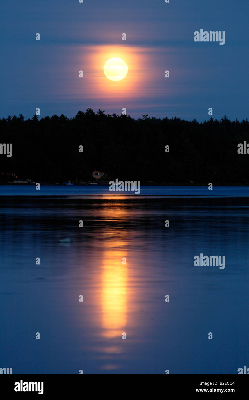 moon rise over a lake Stock Photo - Alamy