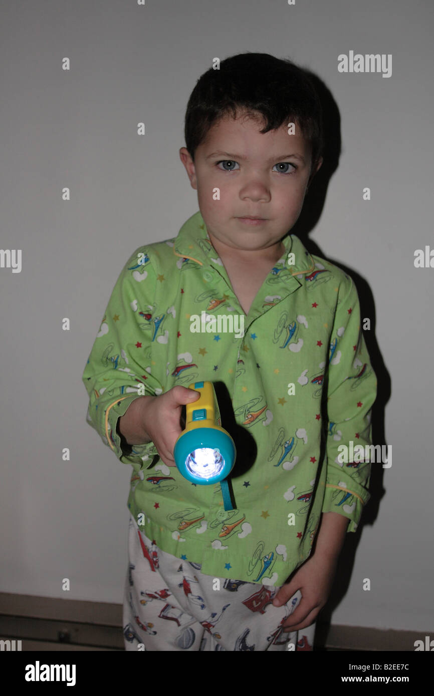 a boy with a flashlight Stock Photo - Alamy