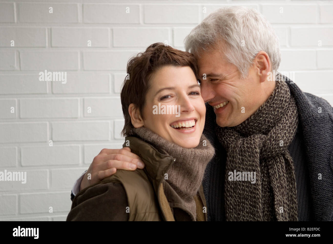 Portrait of a mature man and a mid adult woman romancing Stock Photo ...
