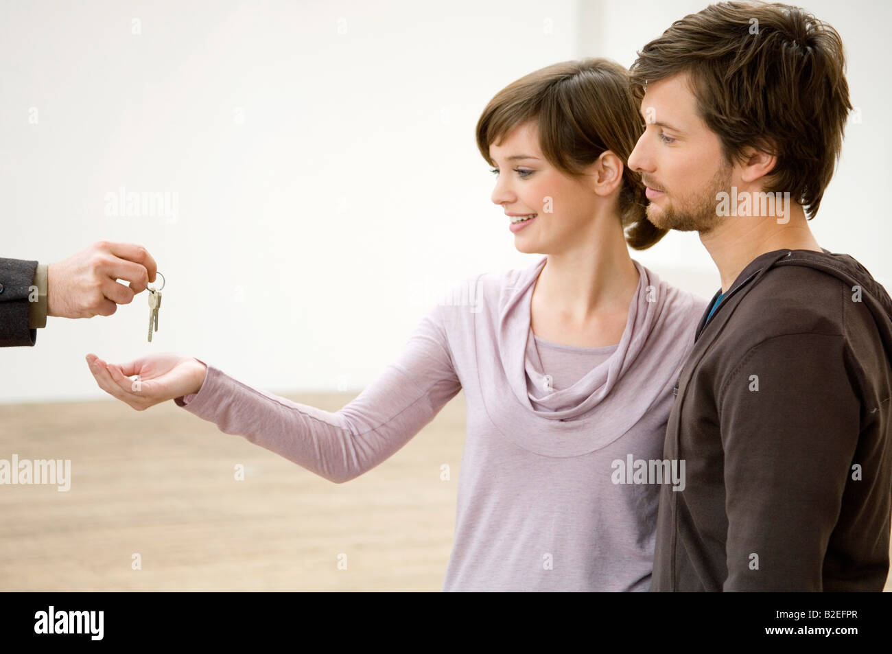 Handing over to hi-res stock photography and images - Alamy