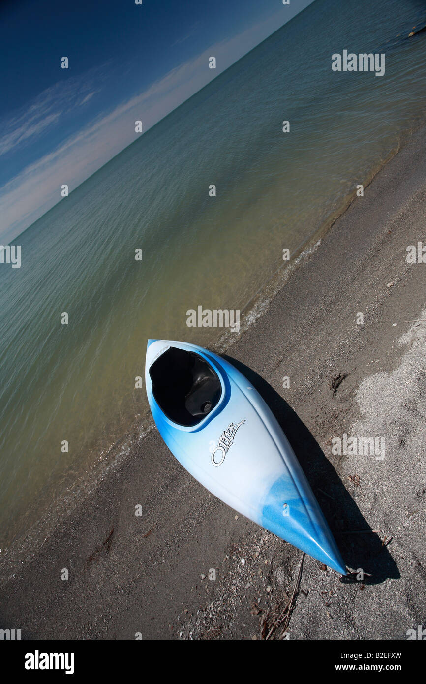 Kayak at waters edge on Lake Winnipeg Stock Photo - Alamy