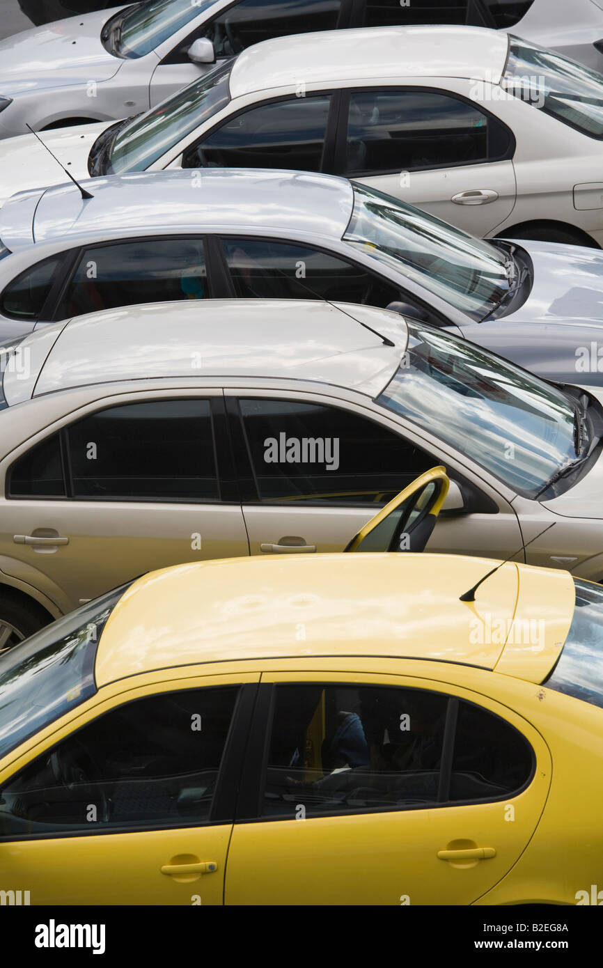 Rows of cars in parking lot Stock Photo - Alamy