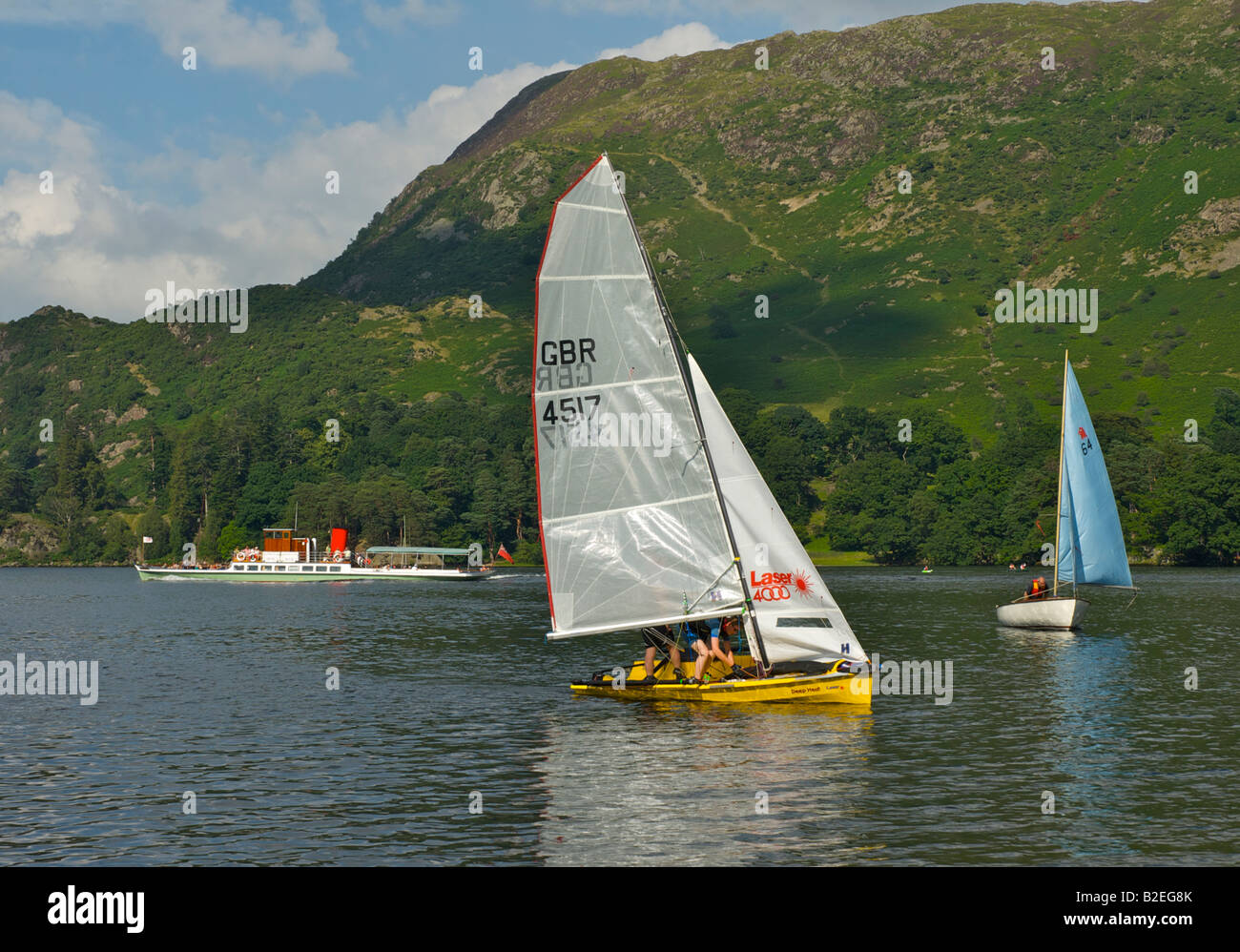Passenger steamer passing two yachts, Ullswater, Lake District National ...