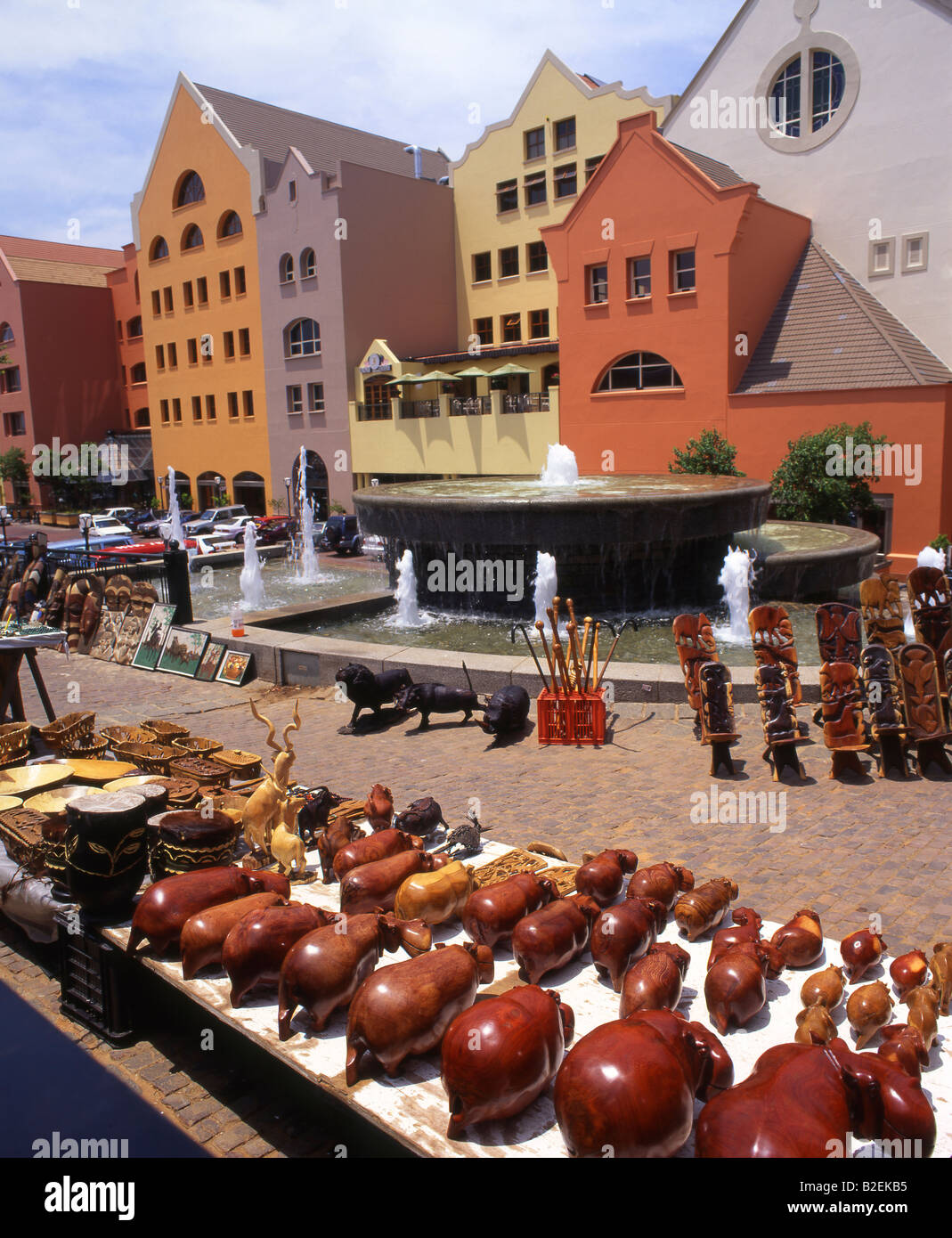 Carved wooden curios for sale at the Village Walk shopping centre Stock ...
