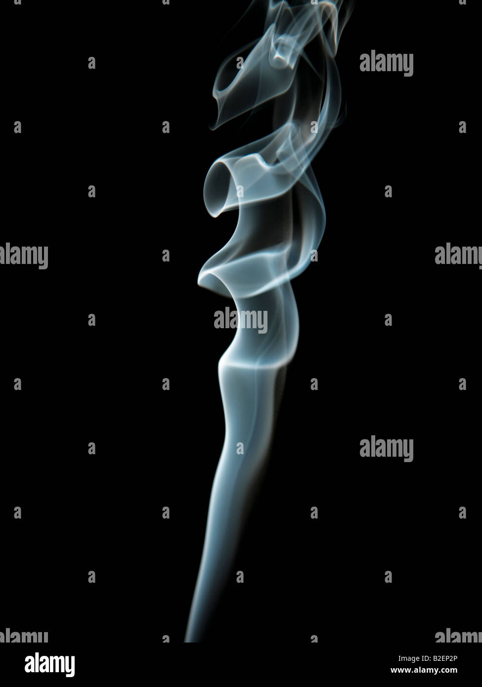 Back lit smoke from an incense stick Stock Photo - Alamy