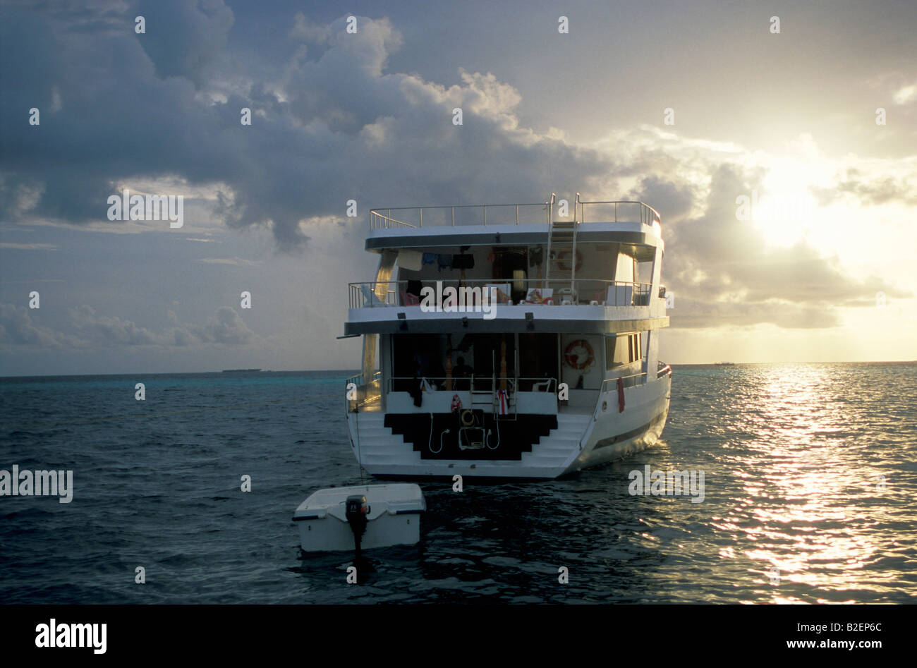Live-aboard sailing, diving and fishing yacht at sunset Stock Photo - Alamy