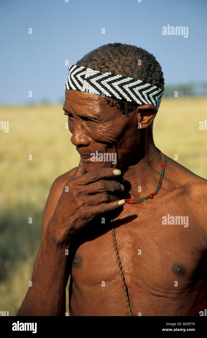 Portrait of a Bushman wearing beaded headband and necklace Stock Photo ...