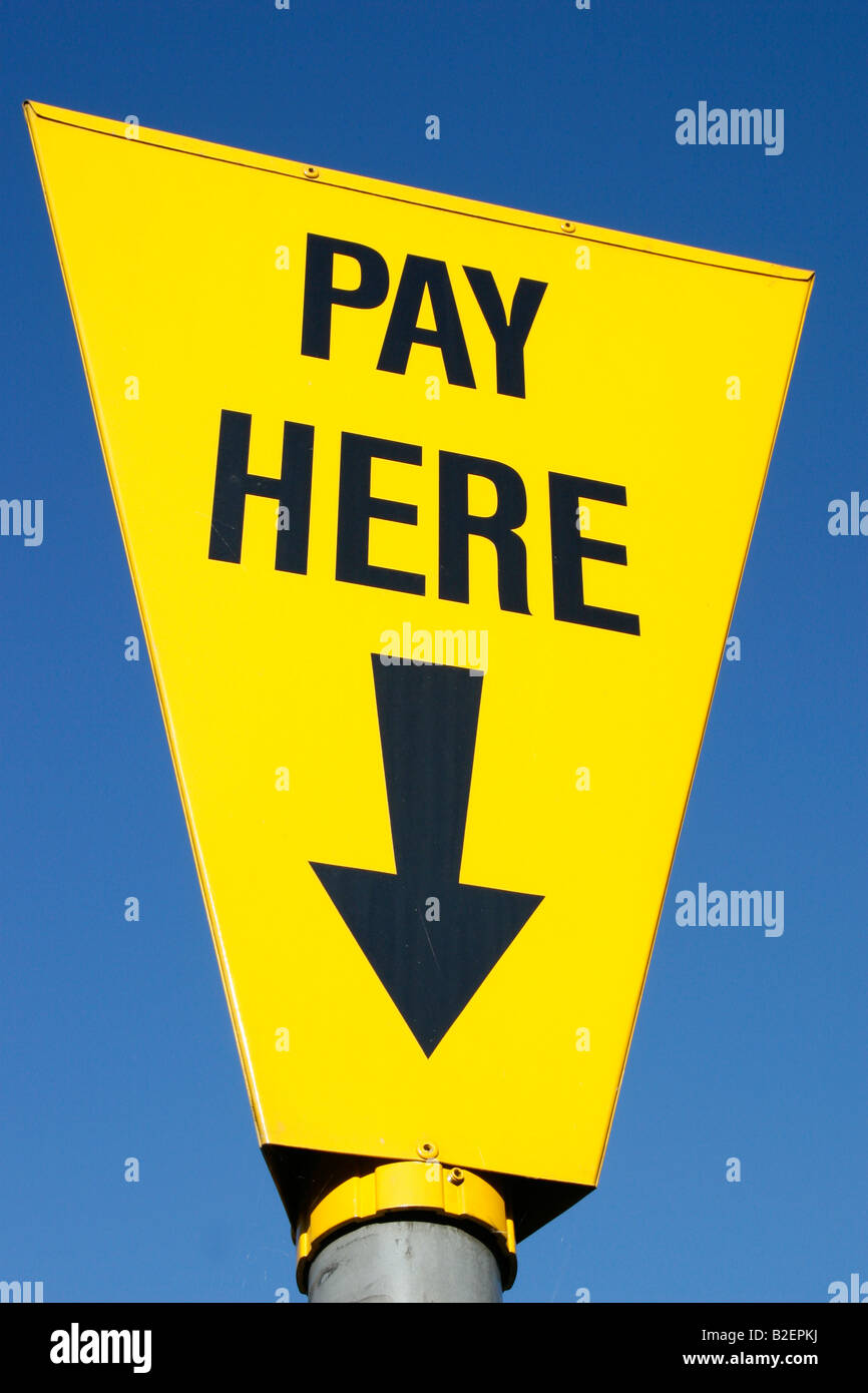 Pay here sign in a car park in the UK Stock Photo - Alamy