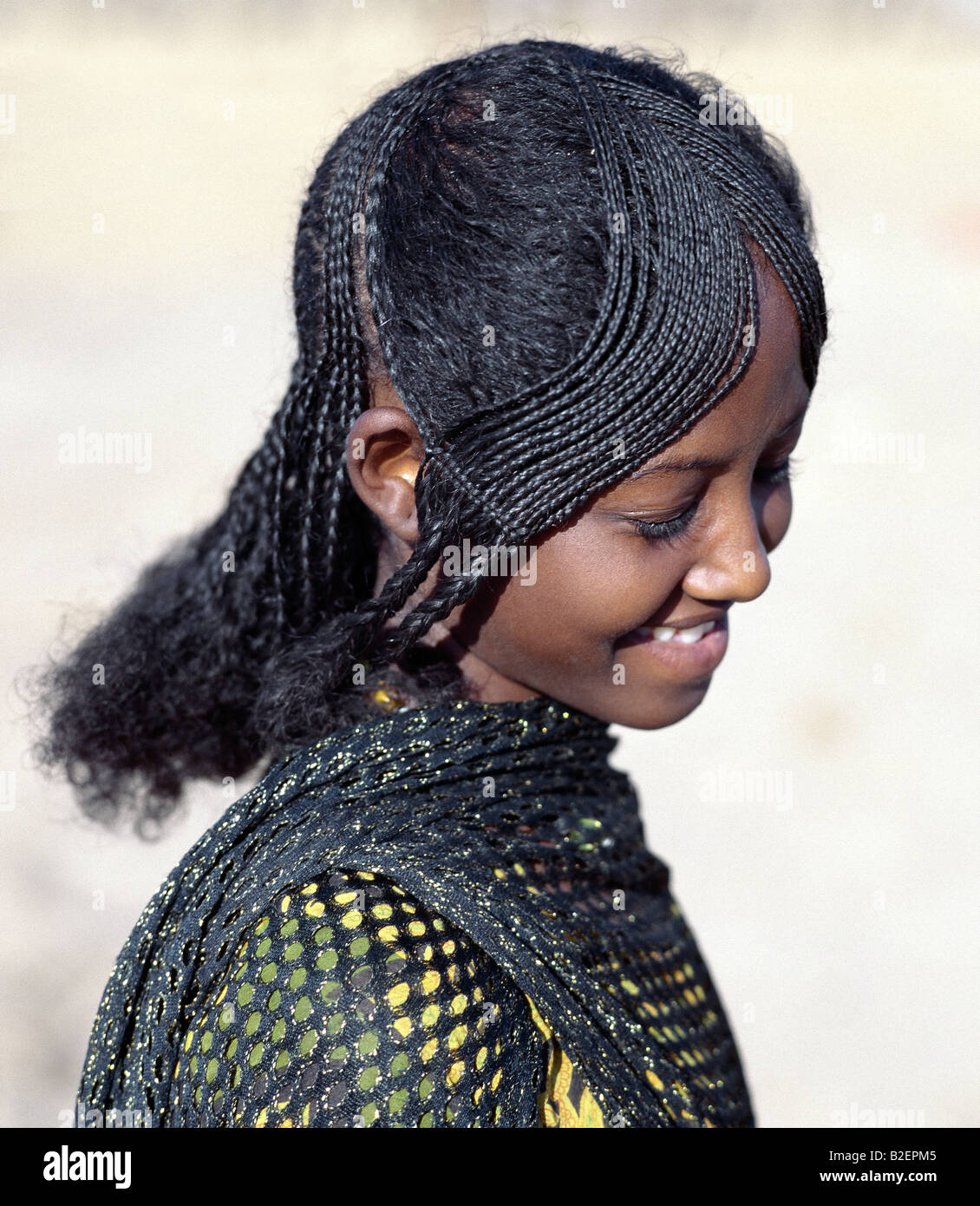 The fetching hairstyle of a young Afar girl Stock Photo - Alamy