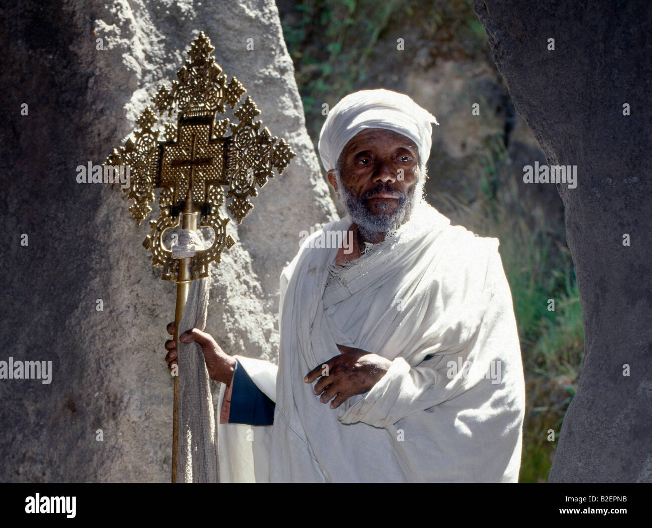 an-old-ethiopian-orthodox-priest-holds-a-large-brass-coptic-cross ...