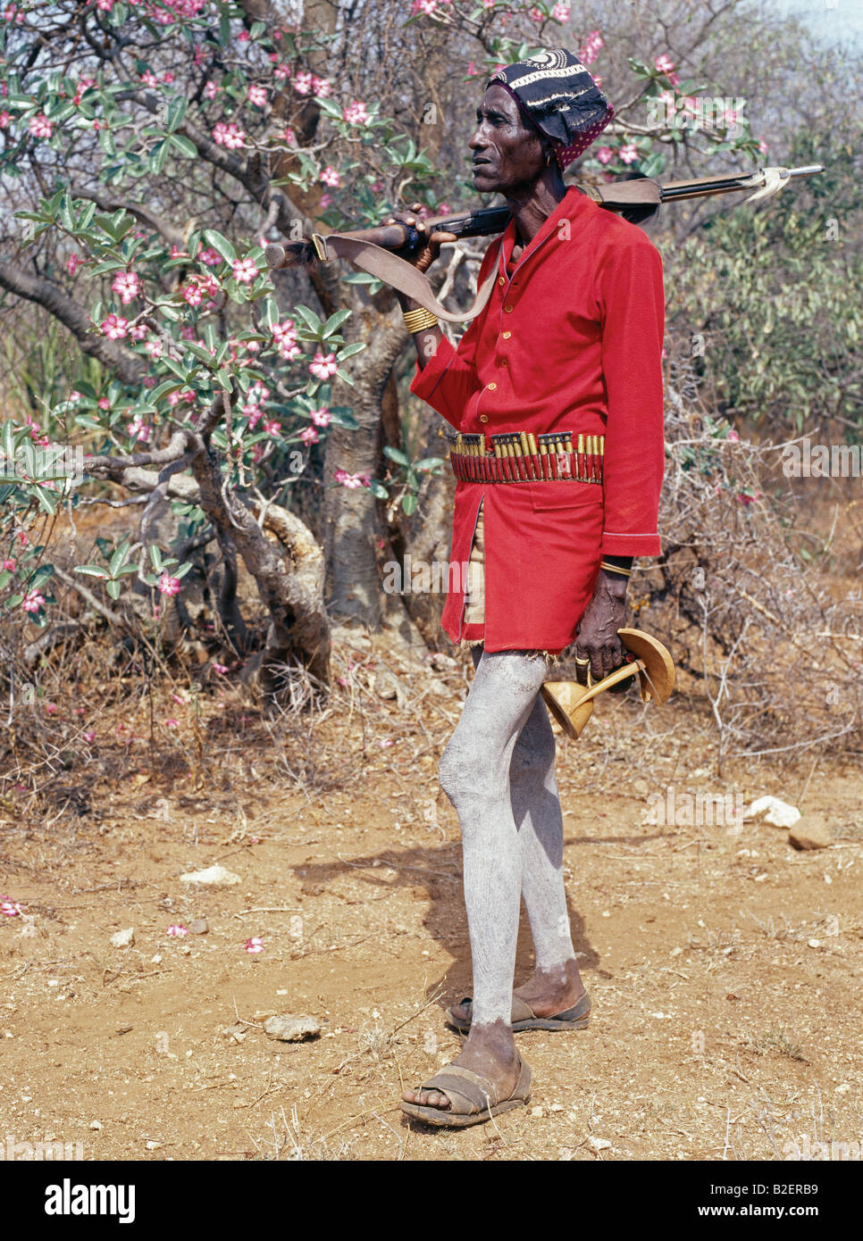 A Hamar man in a mix of traditional and modern dress.The Hamar are semi ...