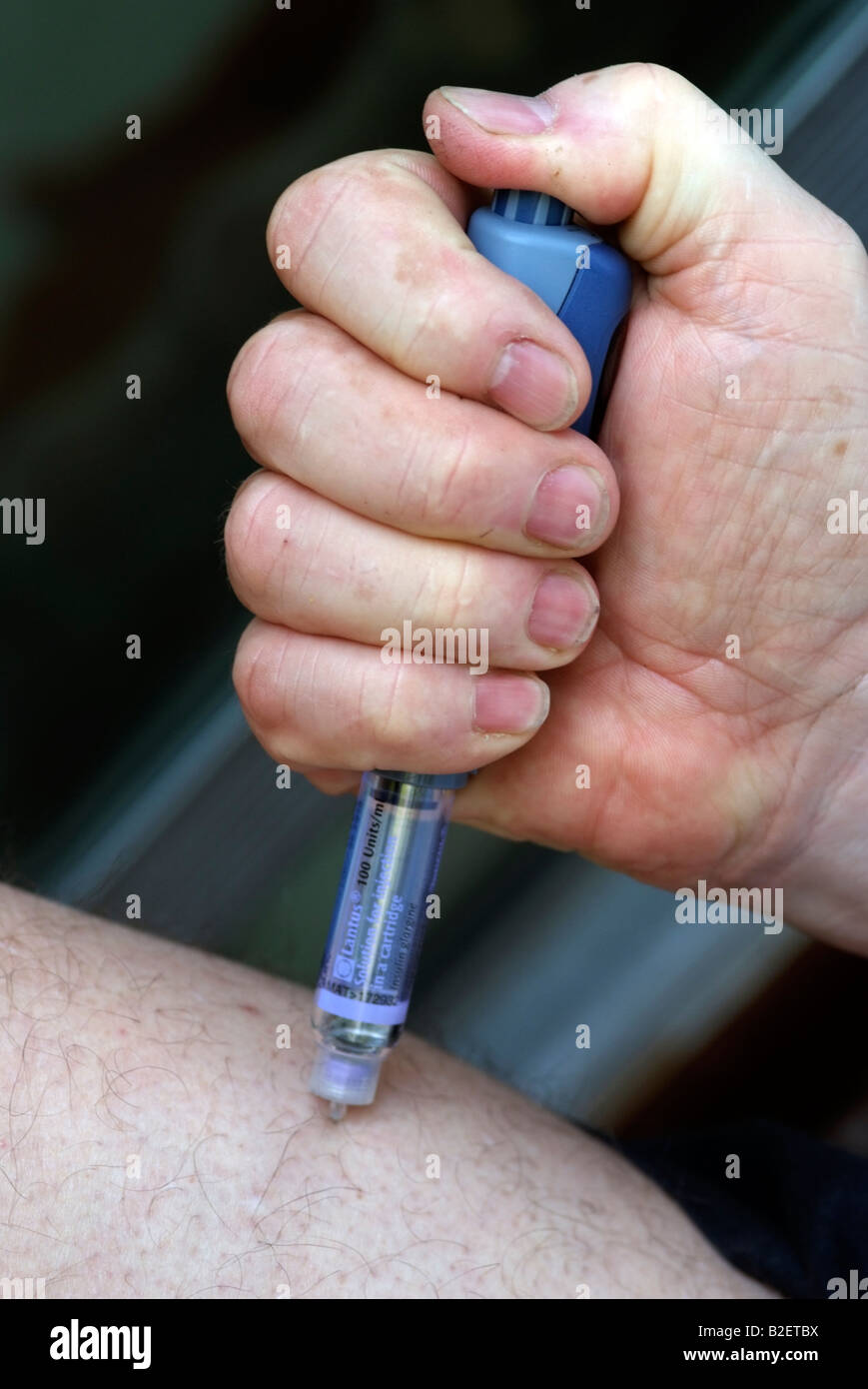 Insulin glargine injection soloution and needle in use by diabetic ...