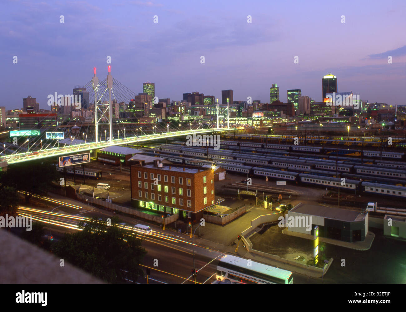 Skyline with Nelson Mandela Bridge passing over the Johannesburg ...