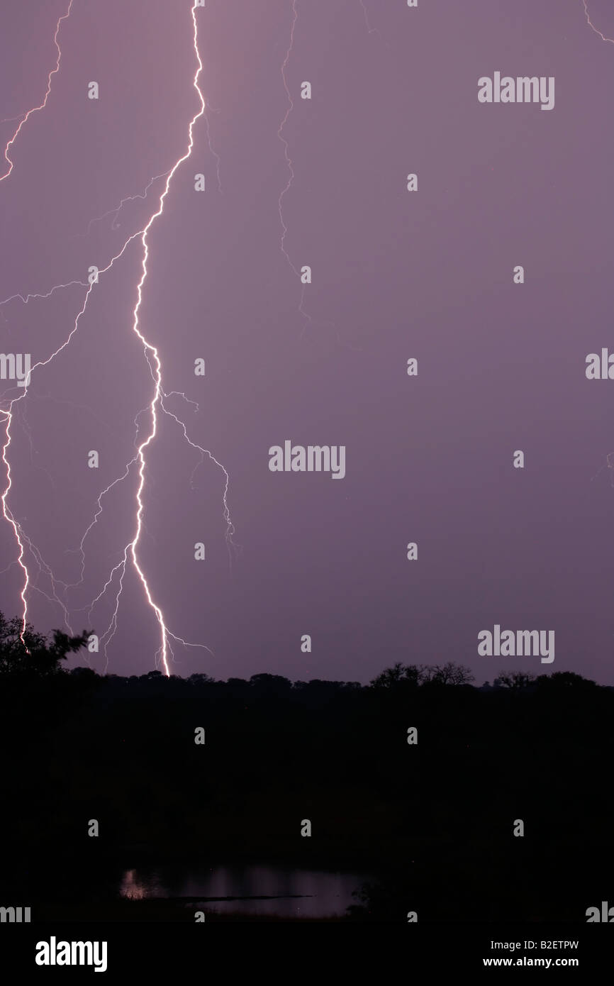 Lightning strike in the night in a small village in Greece with a house ...