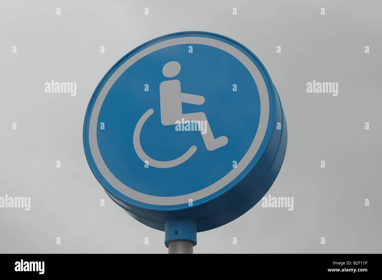 blue circle disabled disability wheelchair sign Stock Photo - Alamy