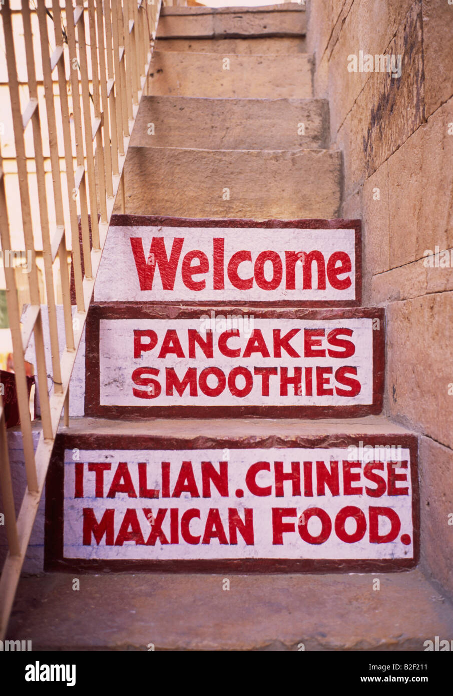 Welcome pancakes smoothies italian chinese mexican food sign on steps ...