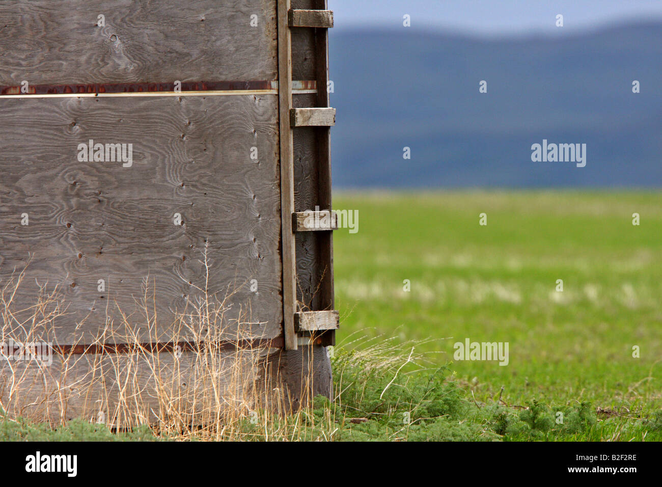 Old grain bin in field Stock Photo - Alamy