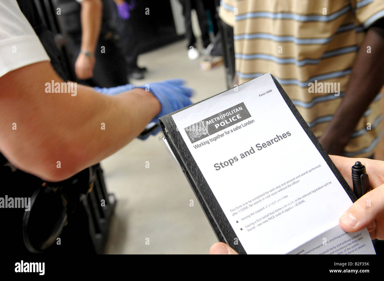 police issuing stop and search Stock Photo - Alamy