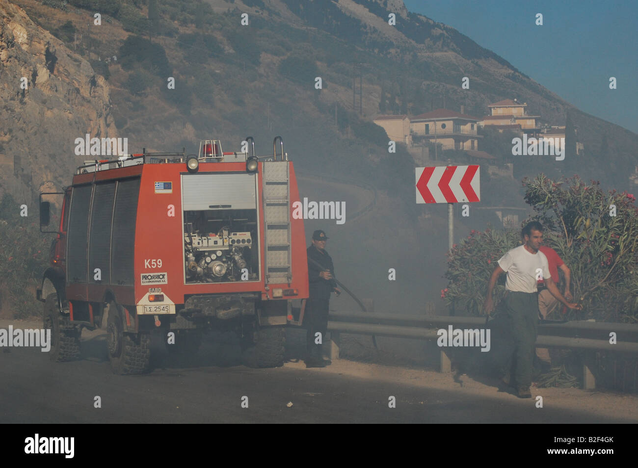 Greek Firefighters in Cephalonia struggling sporadic bush fires Stock ...