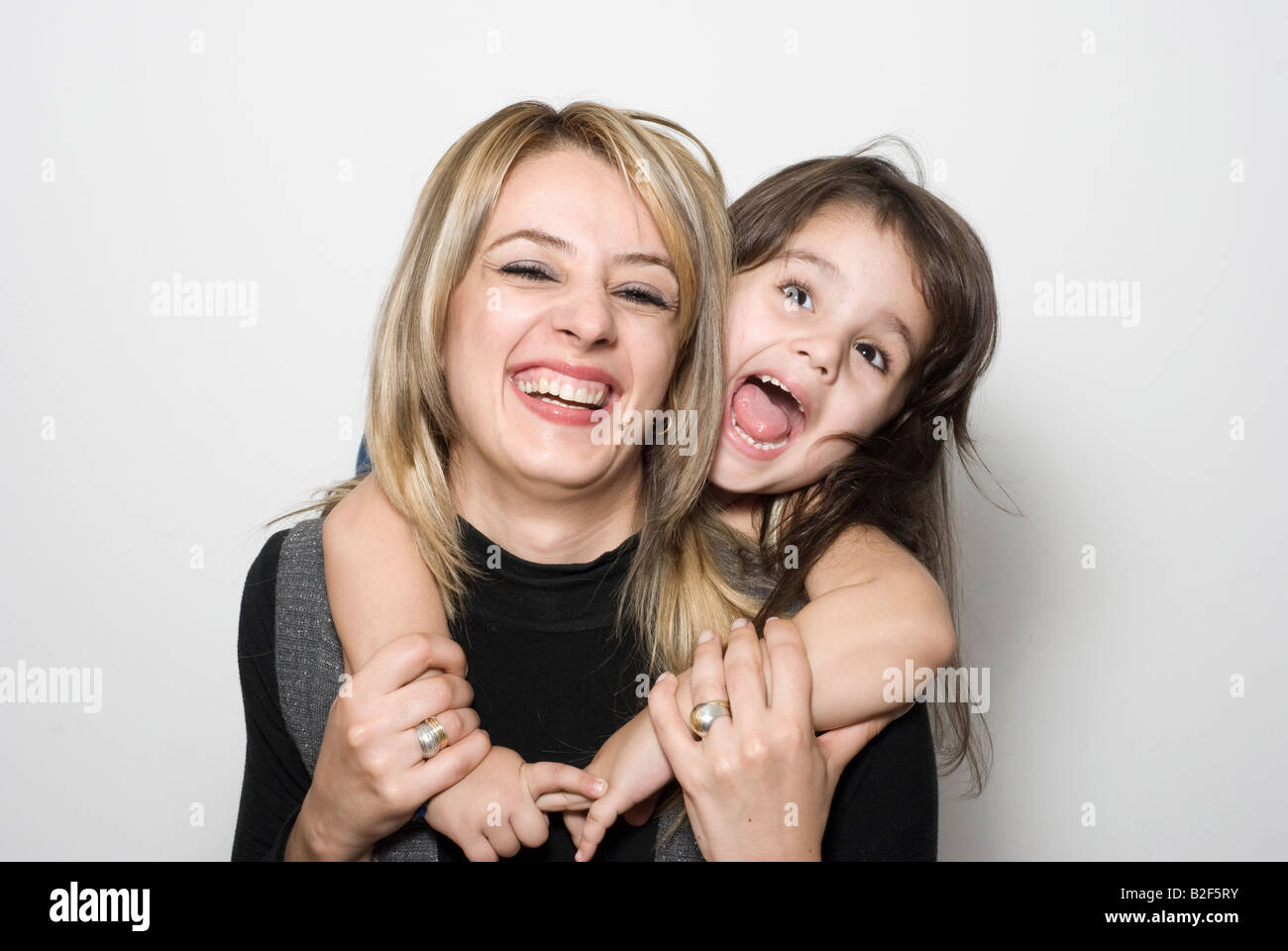 Mother with a daughter. Emotions Stock Photo - Alamy