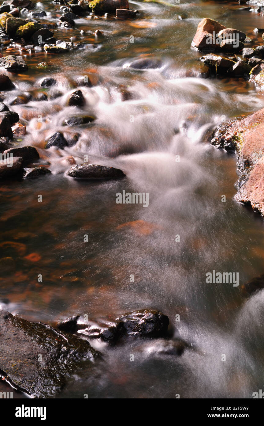 River flowing over rocks Stock Photo - Alamy