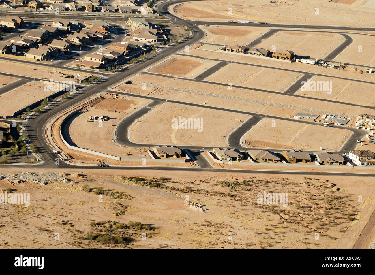 Aerial view of a new housing development on the edge of the desert in ...