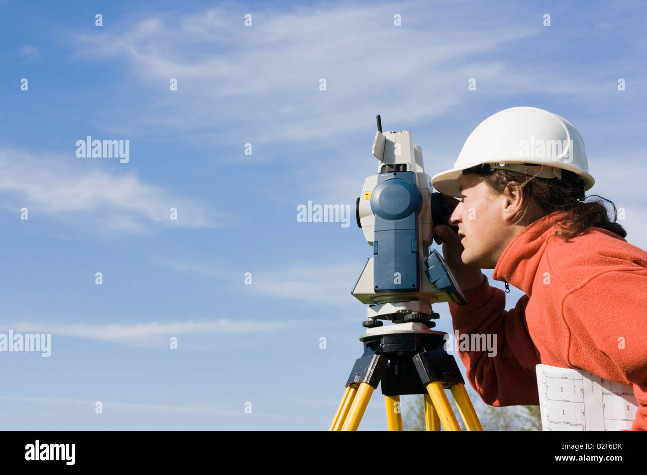 Measuring with theodolite - spring land surveying Stock Photo - Alamy