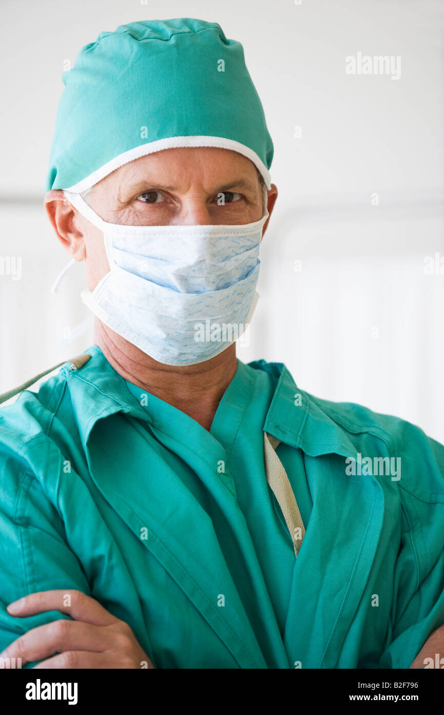Male doctor in mask cap hi-res stock photography and images - Alamy