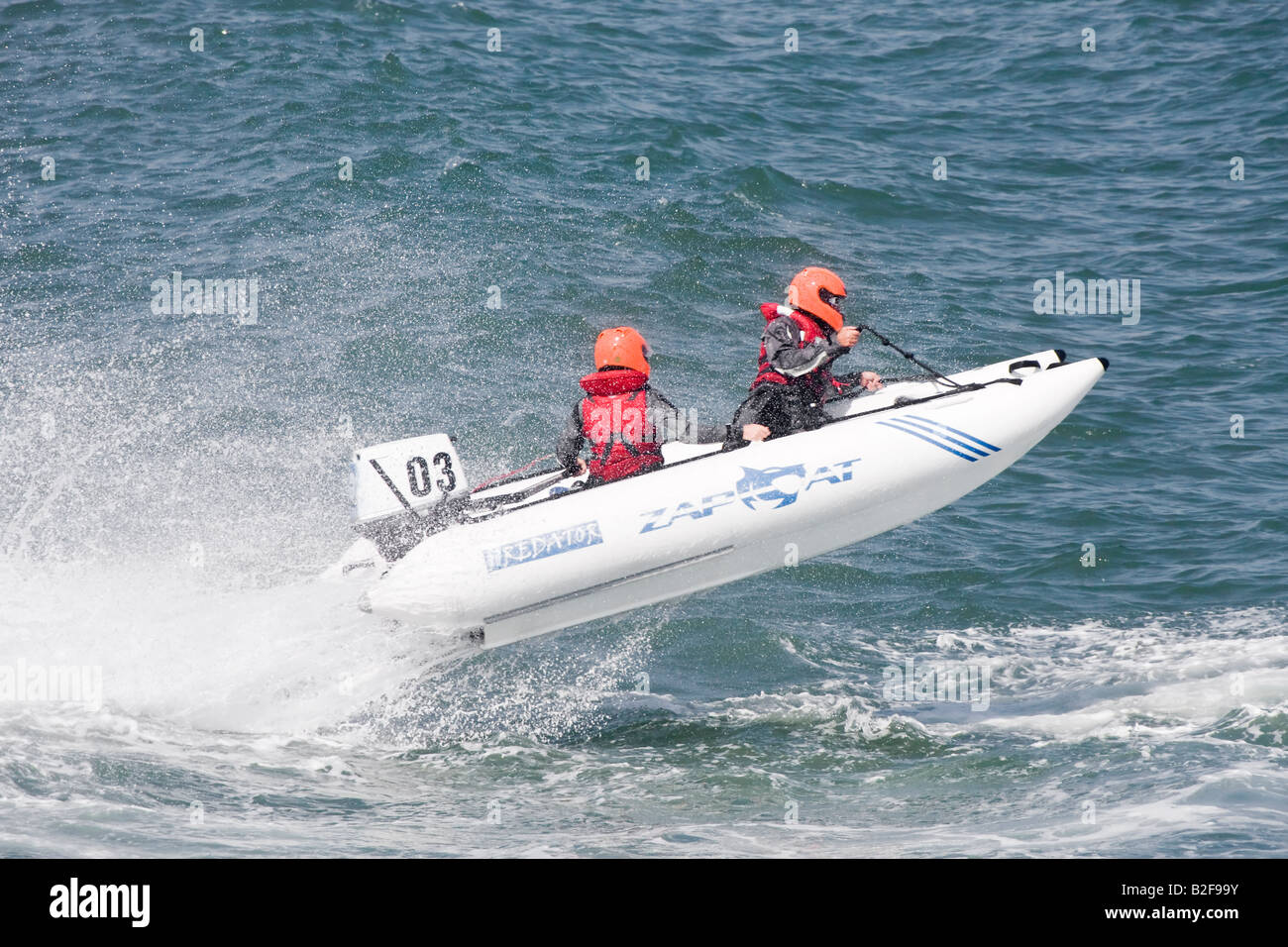 A racing ZapCat inflateable catamaran airborne from the waves Stock ...