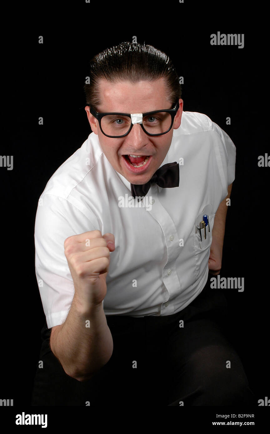 Nerd pumping his fist in the air mimicking running Stock Photo - Alamy