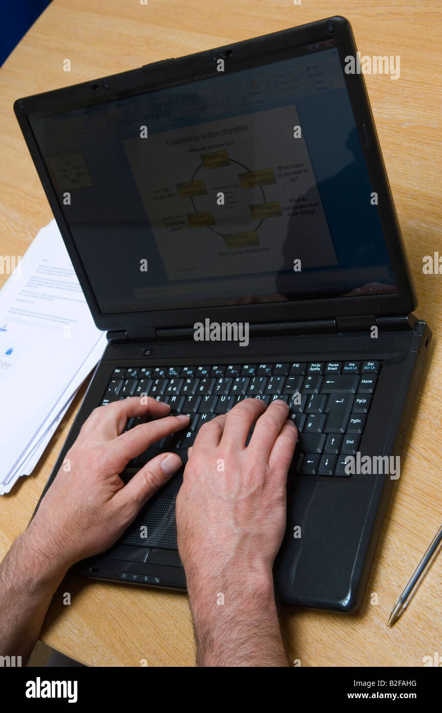 Hands on a computer keyboard Stock Photo - Alamy