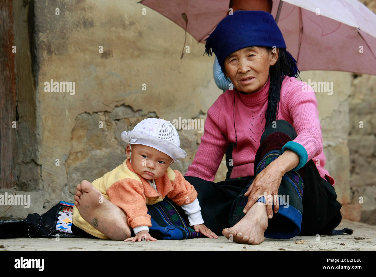 Woman and child at the village of Qingkou, near Yuanyang, Yunnan, China ...