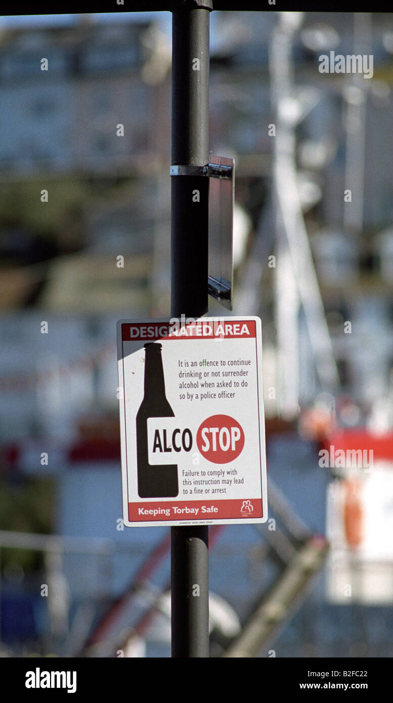 Sign along the harbour side in Brixham Devon England Stock Photo - Alamy