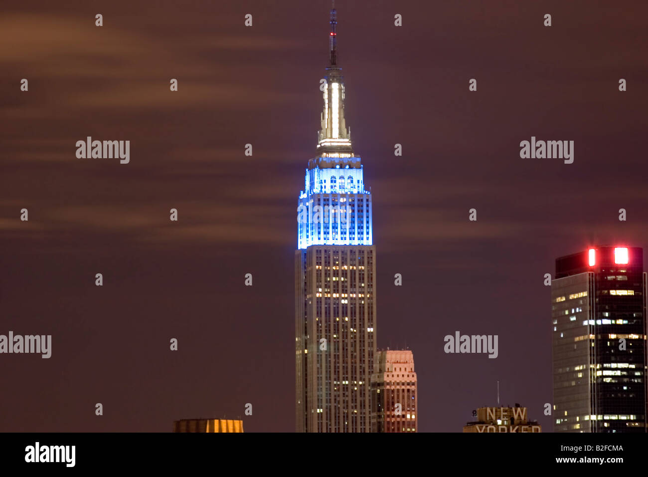 Empire State Building at night Stock Photo - Alamy