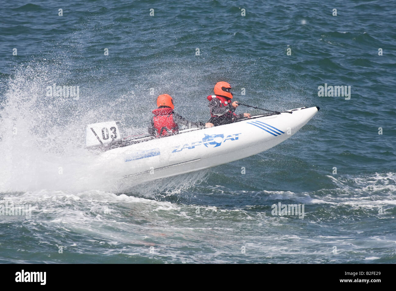 A racing ZapCat inflateable catamaran airborne from the waves Stock ...