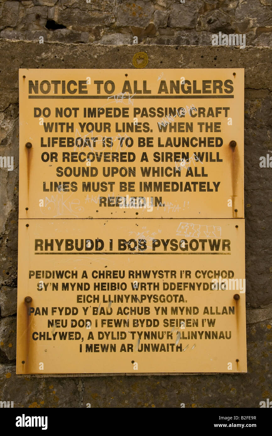 Warning notice for anglers, Porthcawl Harbour M-Glam S Wales GB UK ...