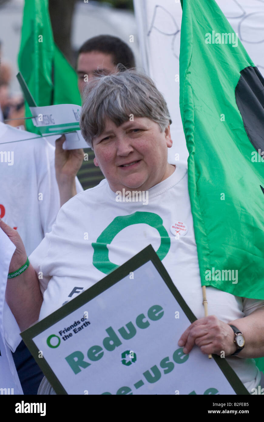 Members of environmental group Friends Of The Earth on the streets with ...