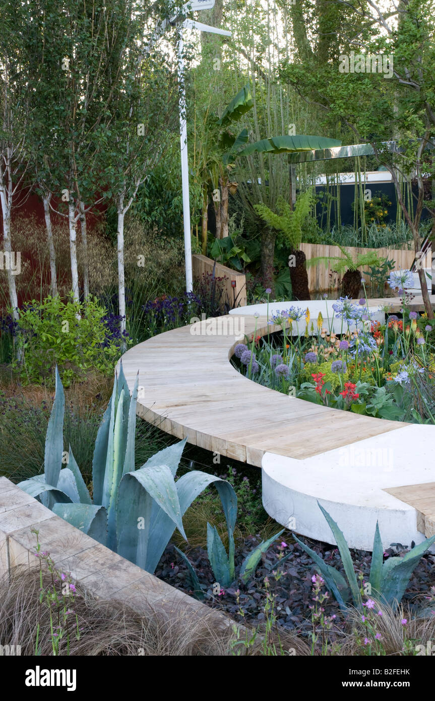 Pathway through flowering plants and textures Stock Photo - Alamy