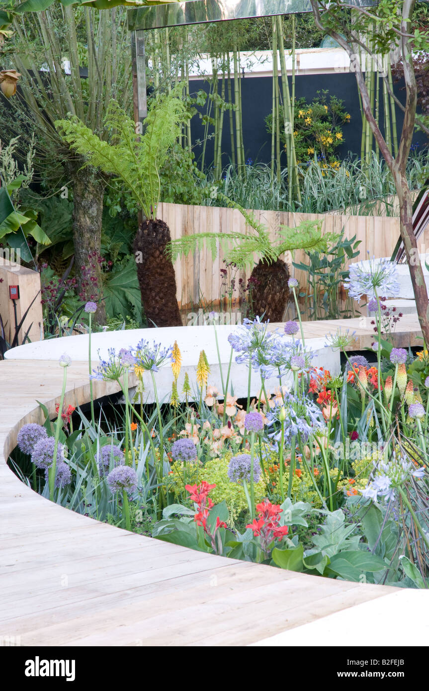 Pathway through flowering plants and textures Stock Photo - Alamy