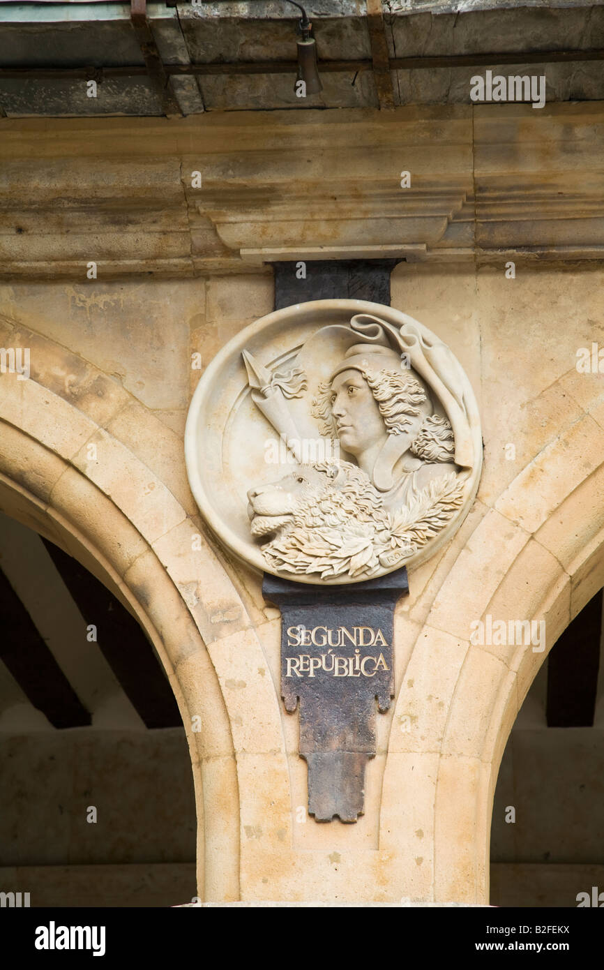 SPAIN Salamanca Circle with stone carving between arches of colonnade ...