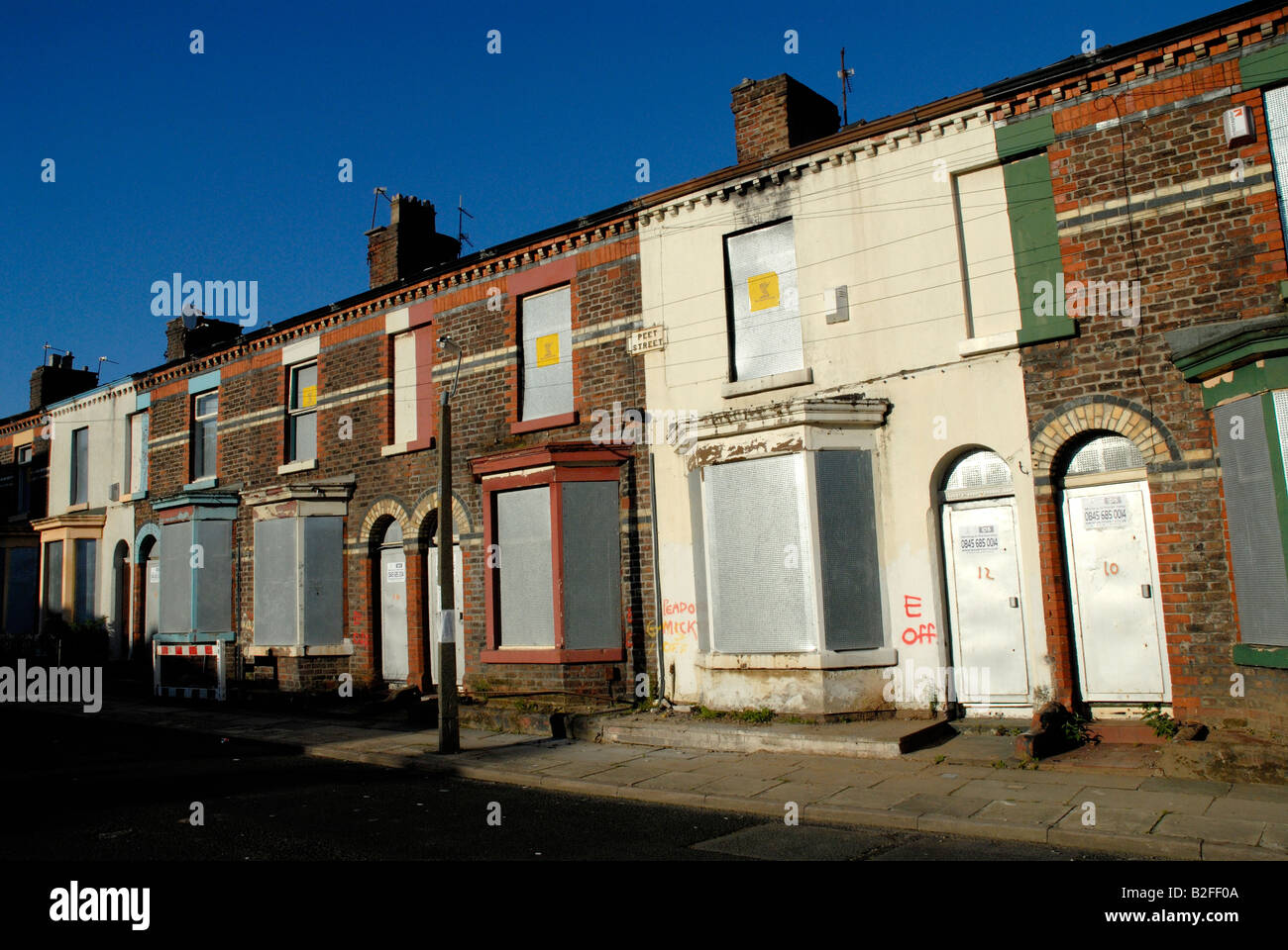 Street of empty houses on a derelict housing estate, Liverpool Stock ...