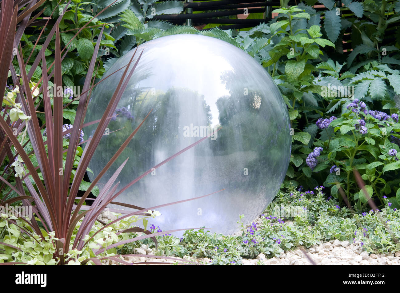 Sphere water feature garden Stock Photo - Alamy