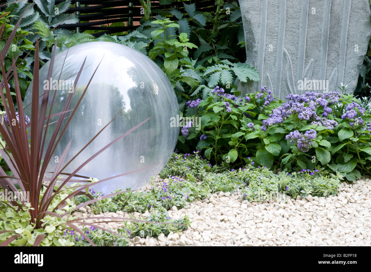 Sphere water feature garden Stock Photo - Alamy