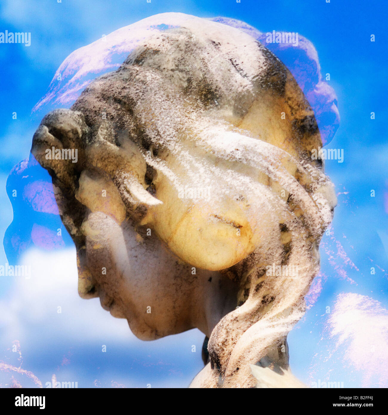 Fusion of two female statue heads with sky background FOR EDITORIAL USE ...