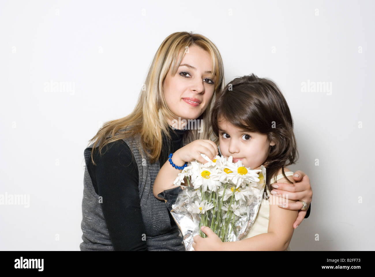Mother with a daughter. Emotions Stock Photo - Alamy