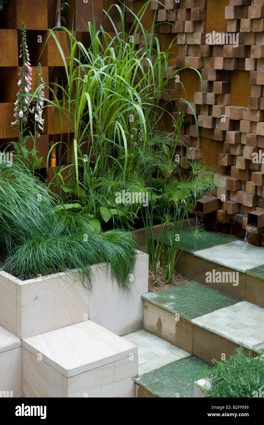 Designer garden with potted plants Stock Photo - Alamy